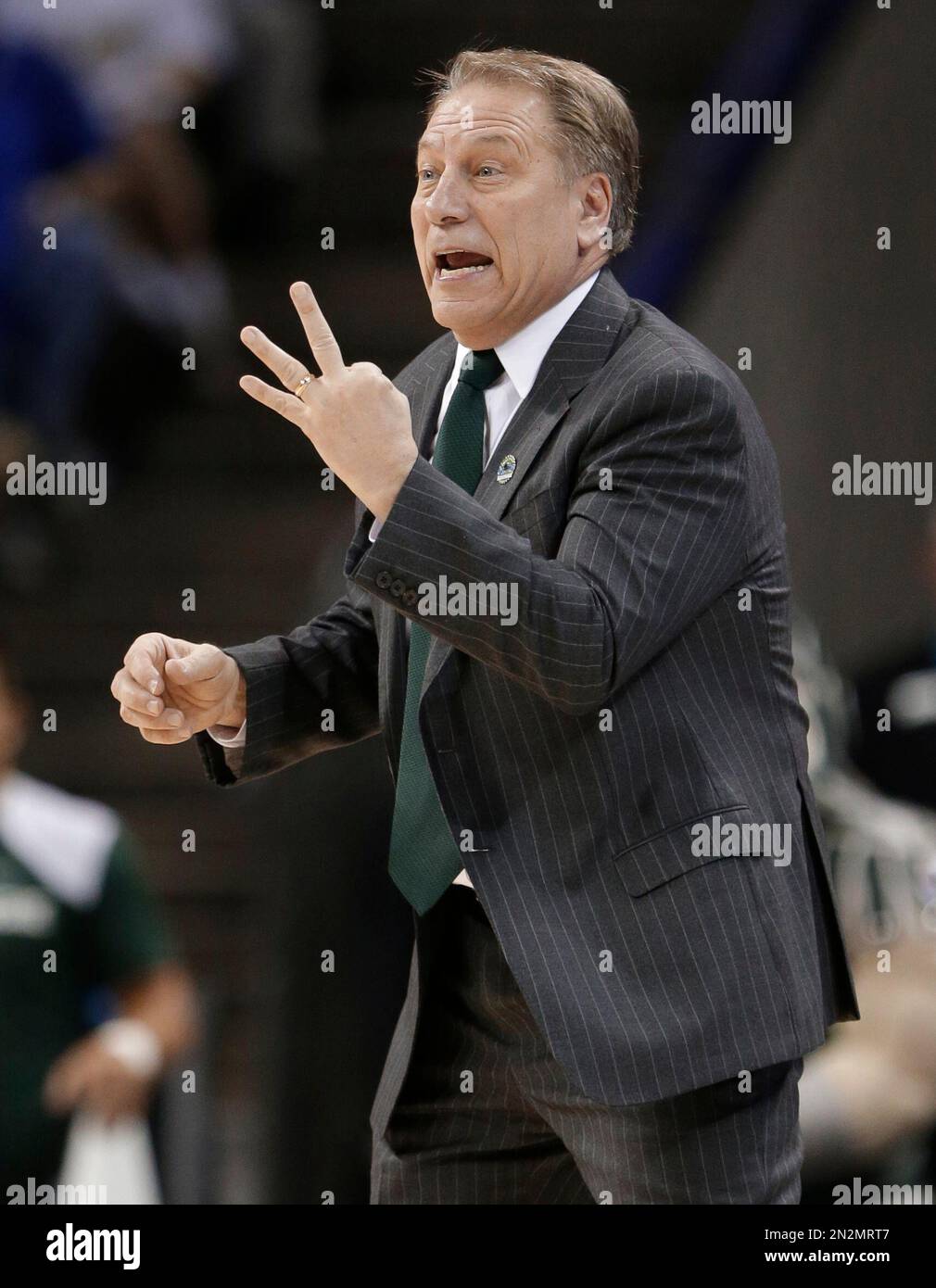 Michigan State head coach Tom Izzo directs his team against Virginia ...