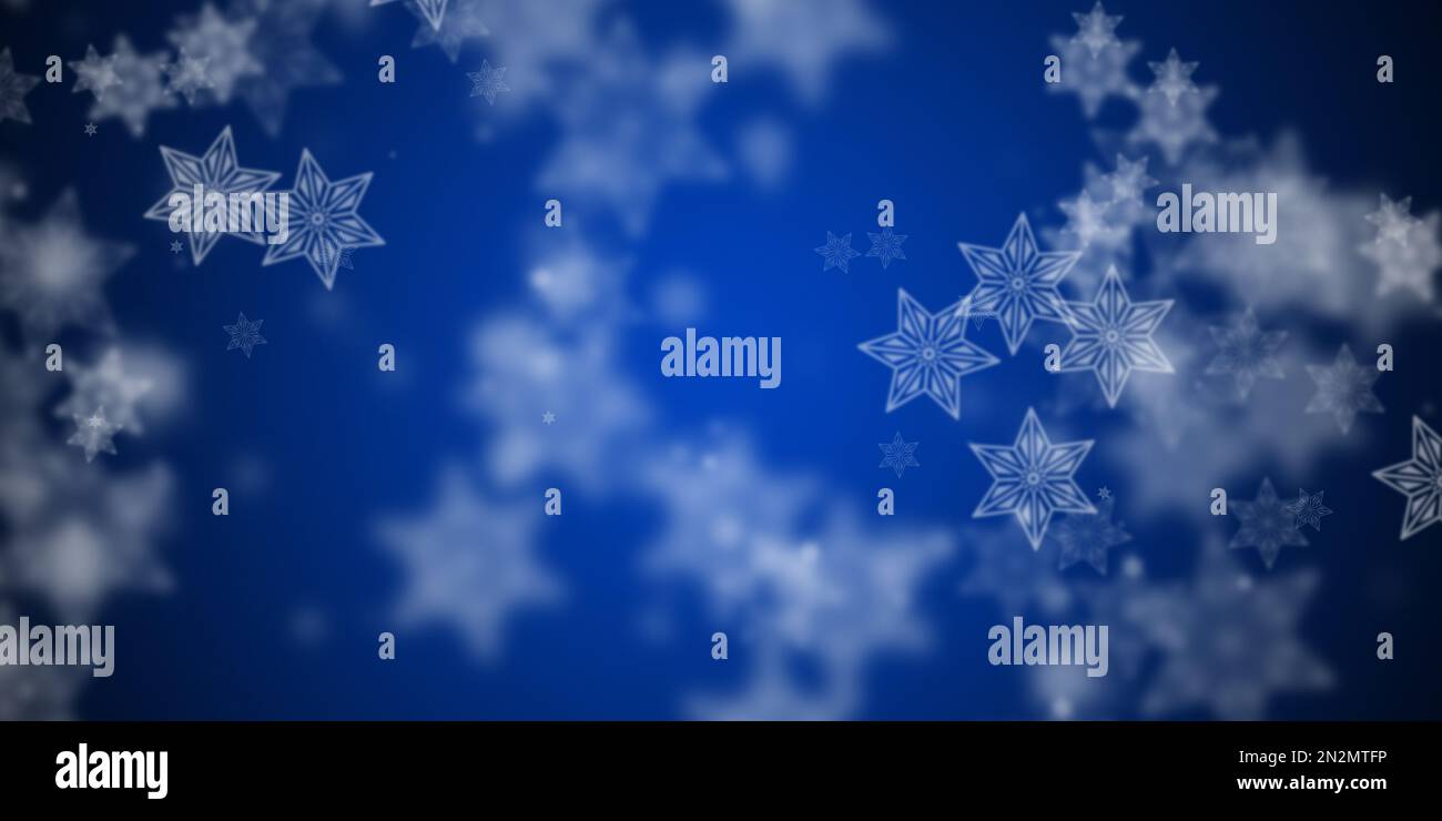 Snowflakes falling over blue hi-res stock photography and images - Alamy