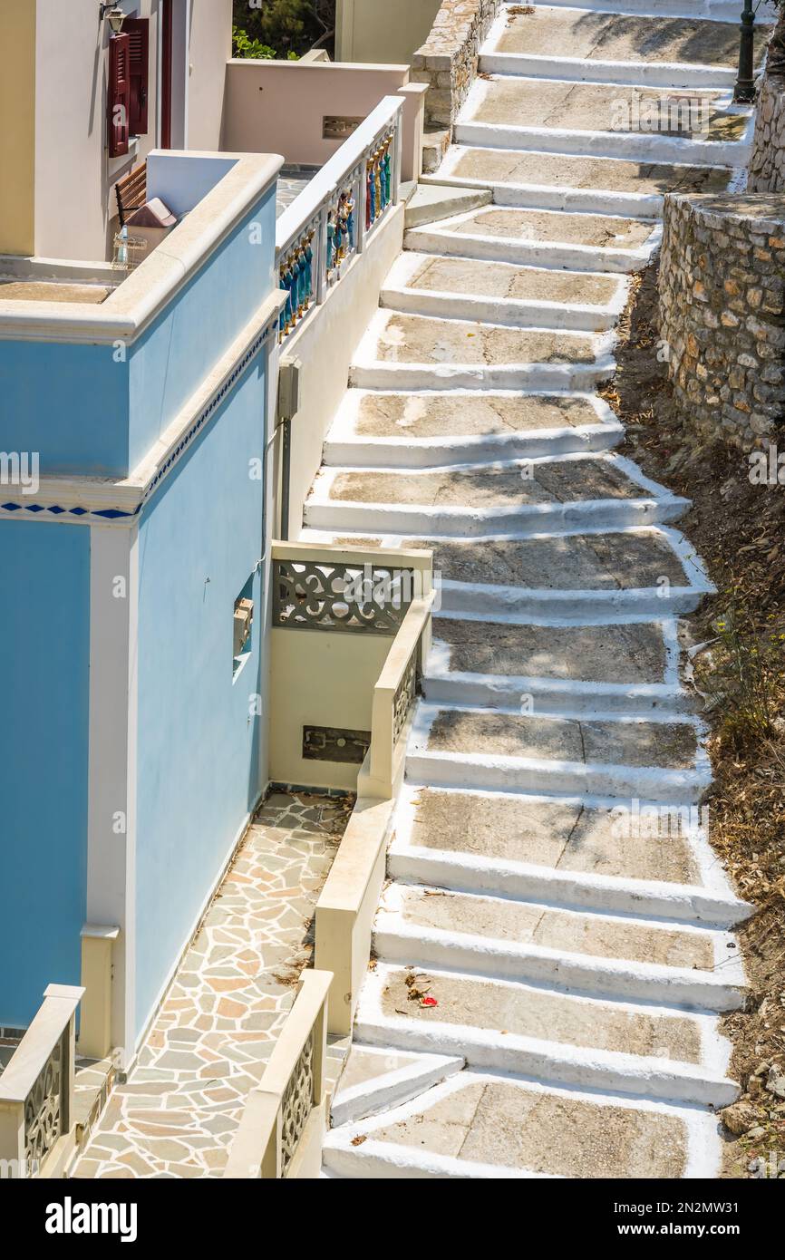 Steep and narrow stair path in Olymbos village in the middle of the ...