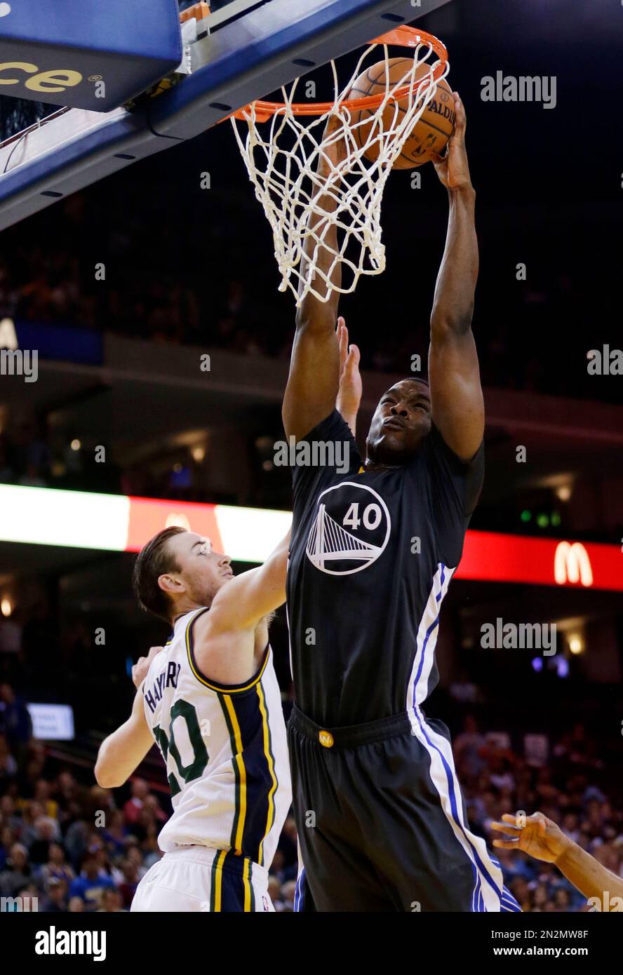 Golden State Warriors' Harrison Barnes, right, dunks past Utah Jazz's ...