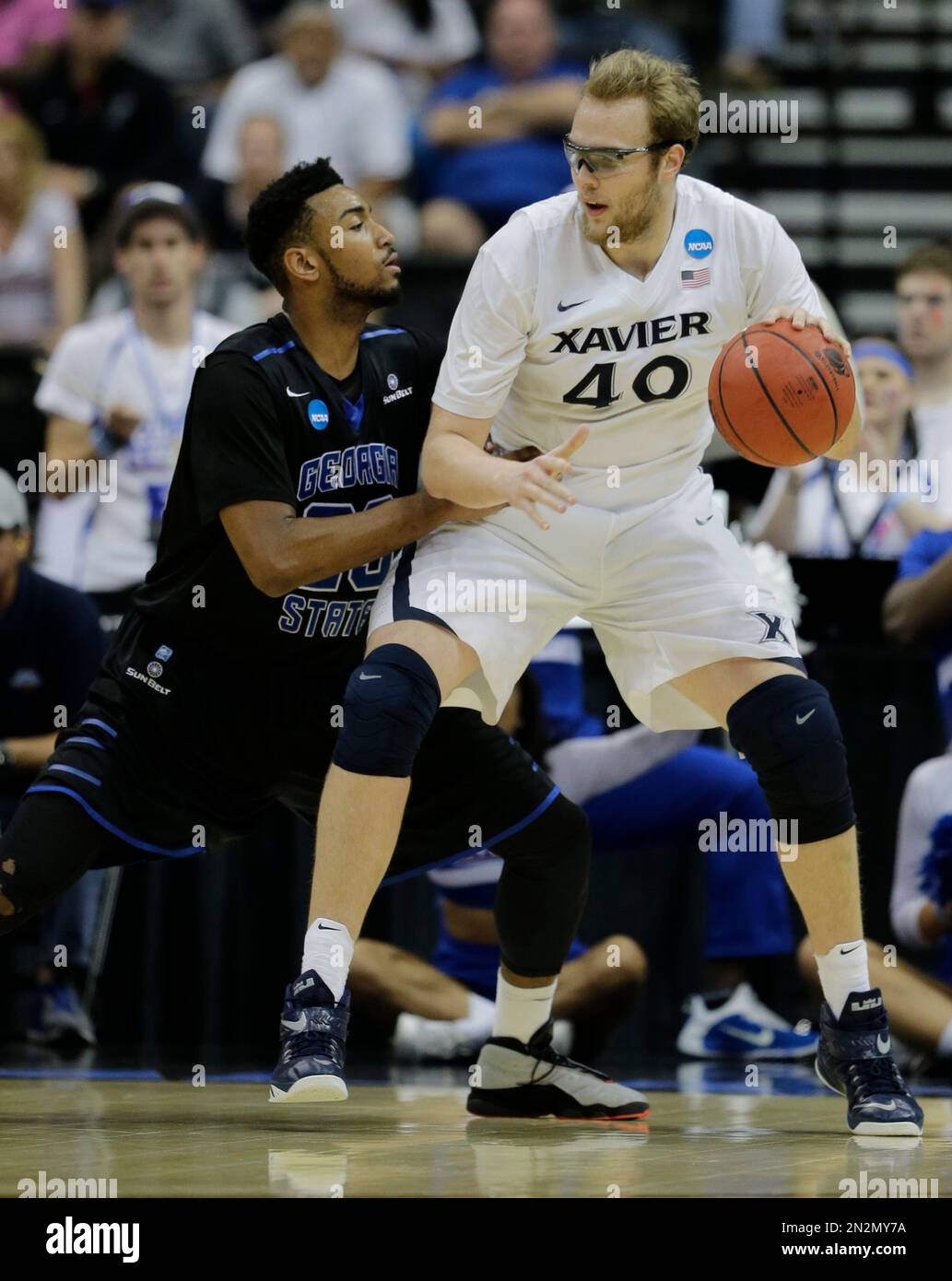 Xavier 's Matt Stainbrook (40) looks for a way around Georgia State's ...