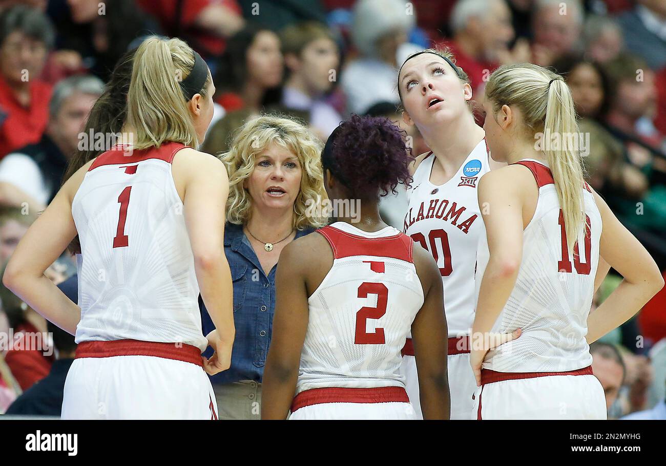 Oklahoma head coach Sherri Coale alks to her players during a timeout ...