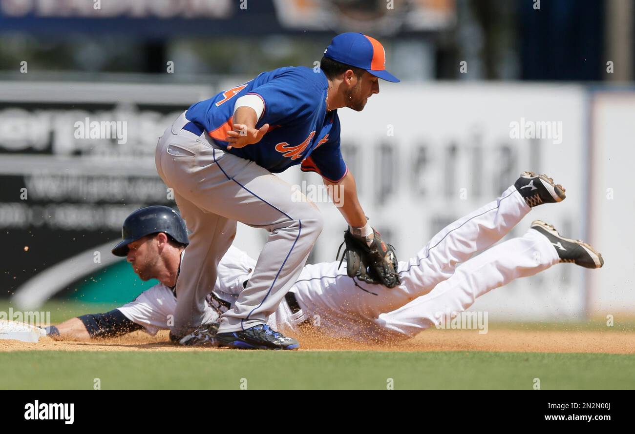 Detroit Tigers' Andrew Romine beats the tag of New York Mets second ...