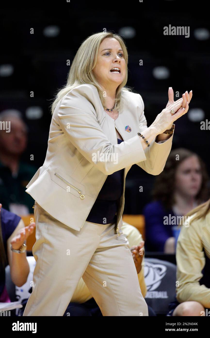Pittsburgh head coach Suzie McConnell-Serio watches from the bench in the first half of an NCAA ...