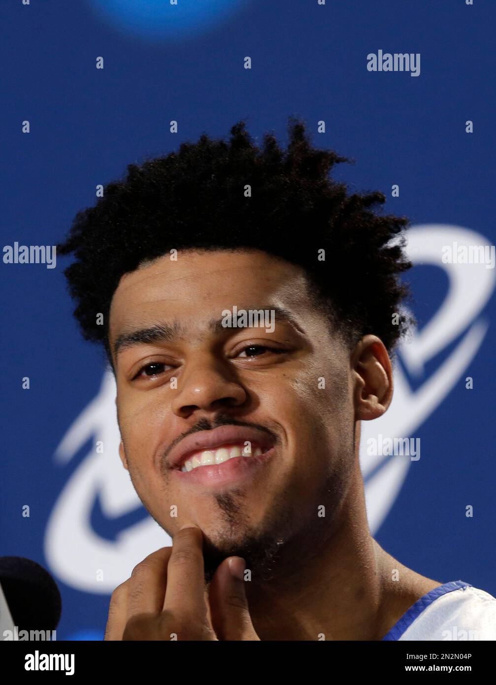 Duke guard Quinn Cook speaks during a news conference at the NCAA ...