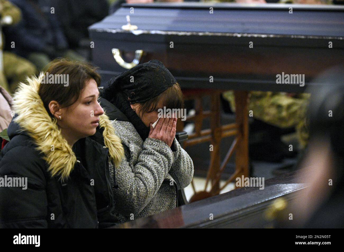Non Exclusive: KYIV, UKRAINE - FEBRUARY 06, 2023 -Women cry during the ...