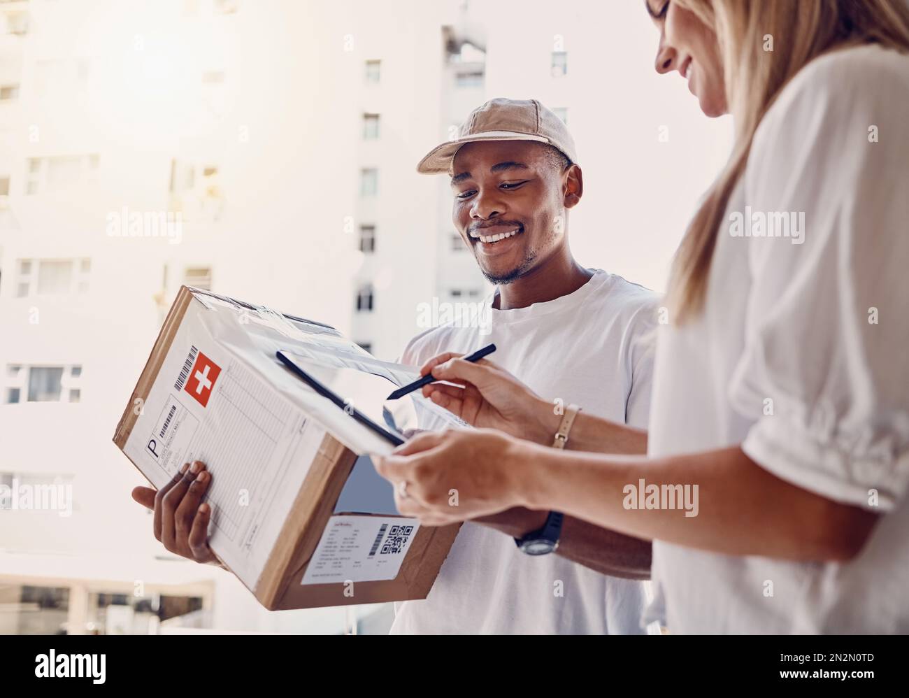 Black man, tablet or woman signing for delivery, courier parcel or ...