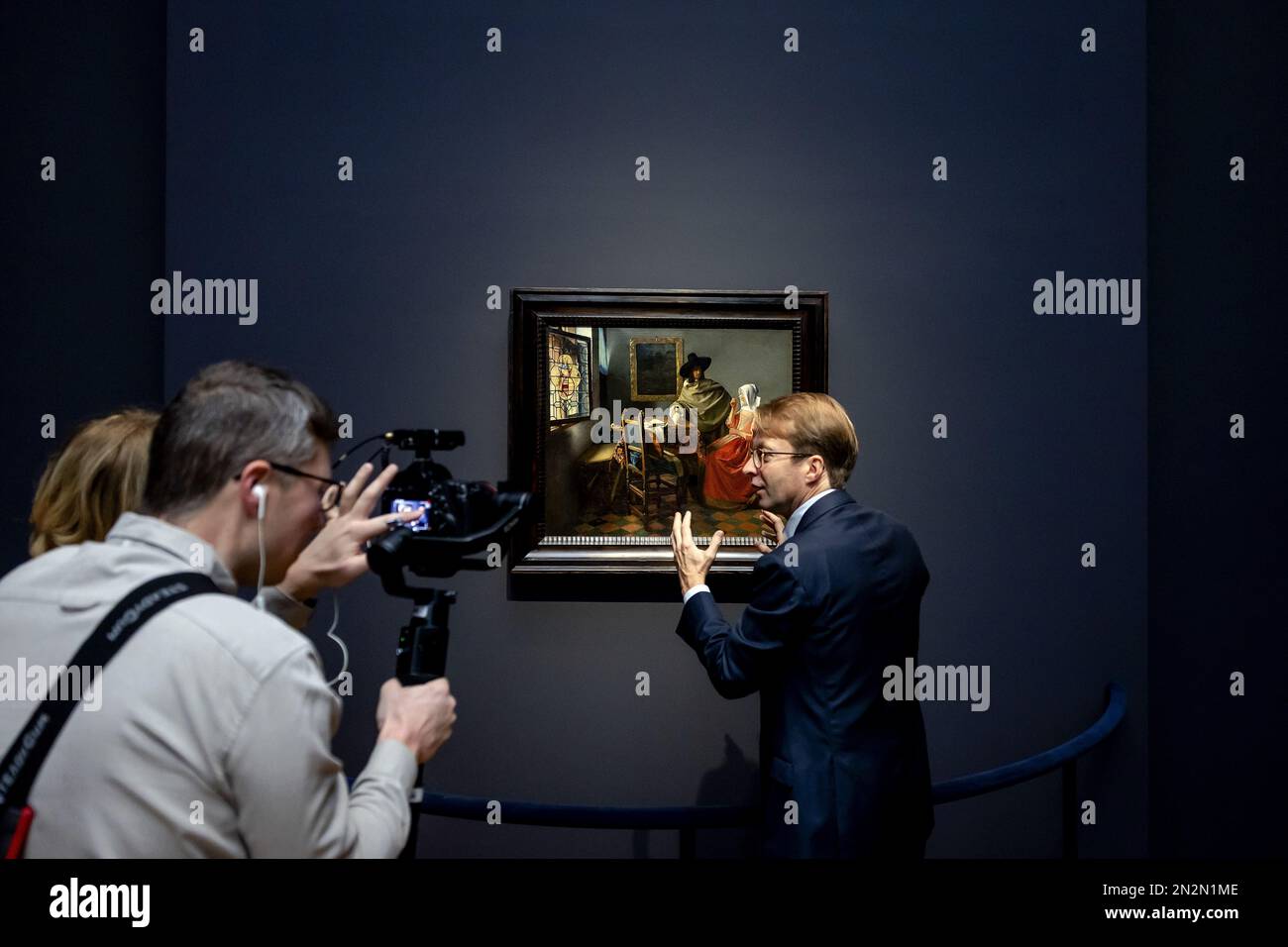 AMSTERDAM - The painting The Glass of Wine by Johannes Vermeer during a ...