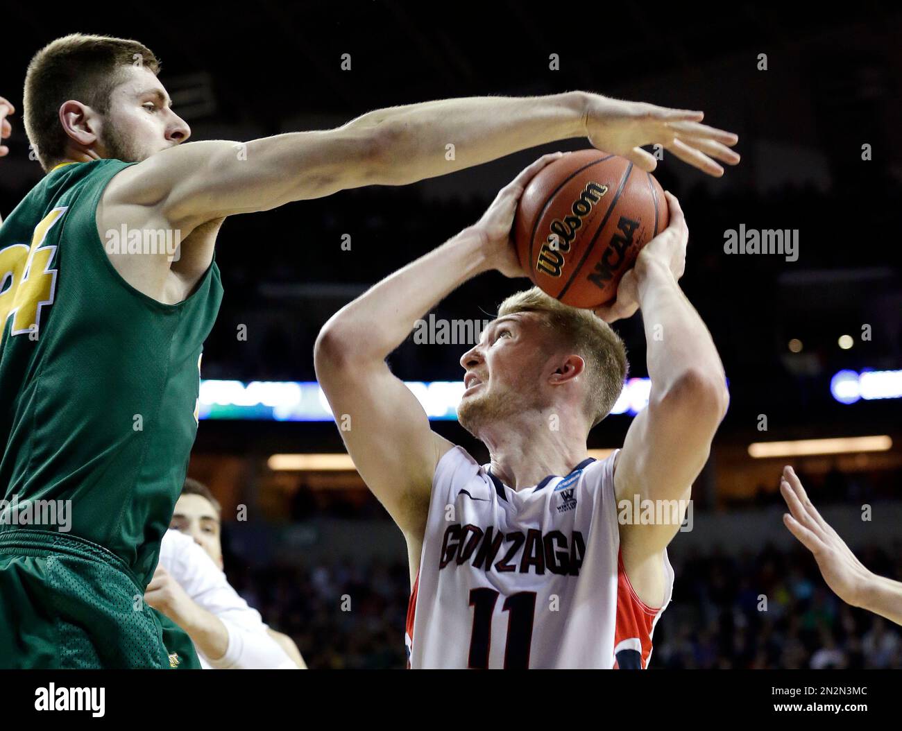 North Dakota State's Chris Kading, left, tries to block a shot by Gonzaga's Domantas Sabonis ...