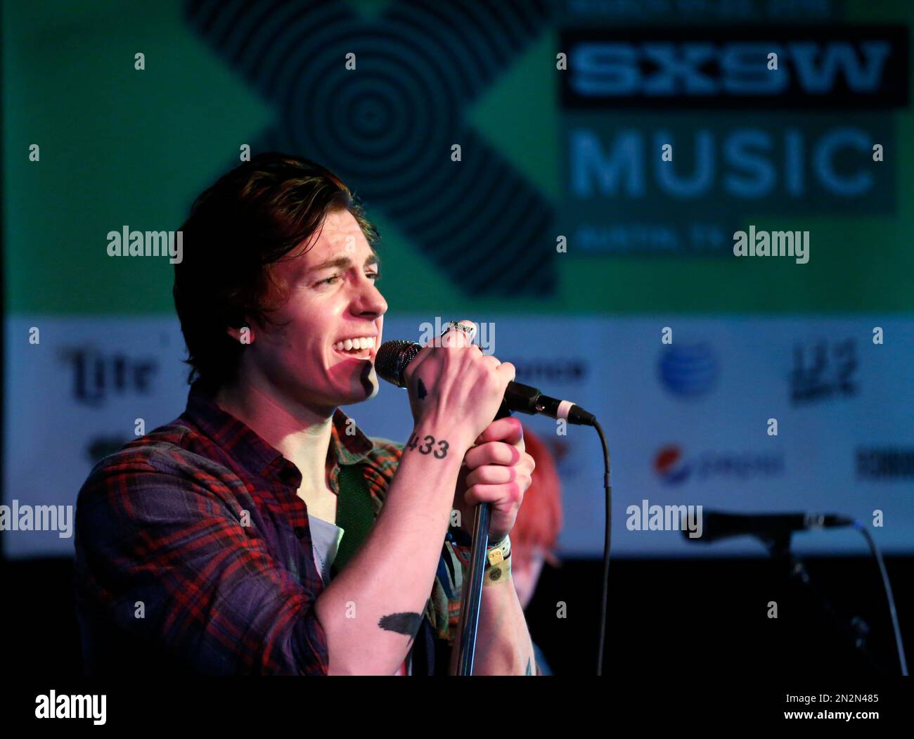 Andy Tongren, lead singer, of Rising Young Sons is seen on the ...
