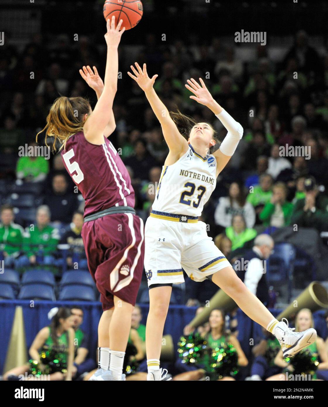 Montana guard McCalle Feller (5) passes over Notre Dame guard Michaela ...