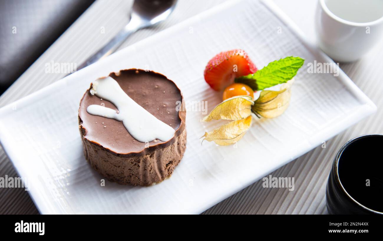 Coulant. Molten chocolate cake is a popular dessert that combines the ...