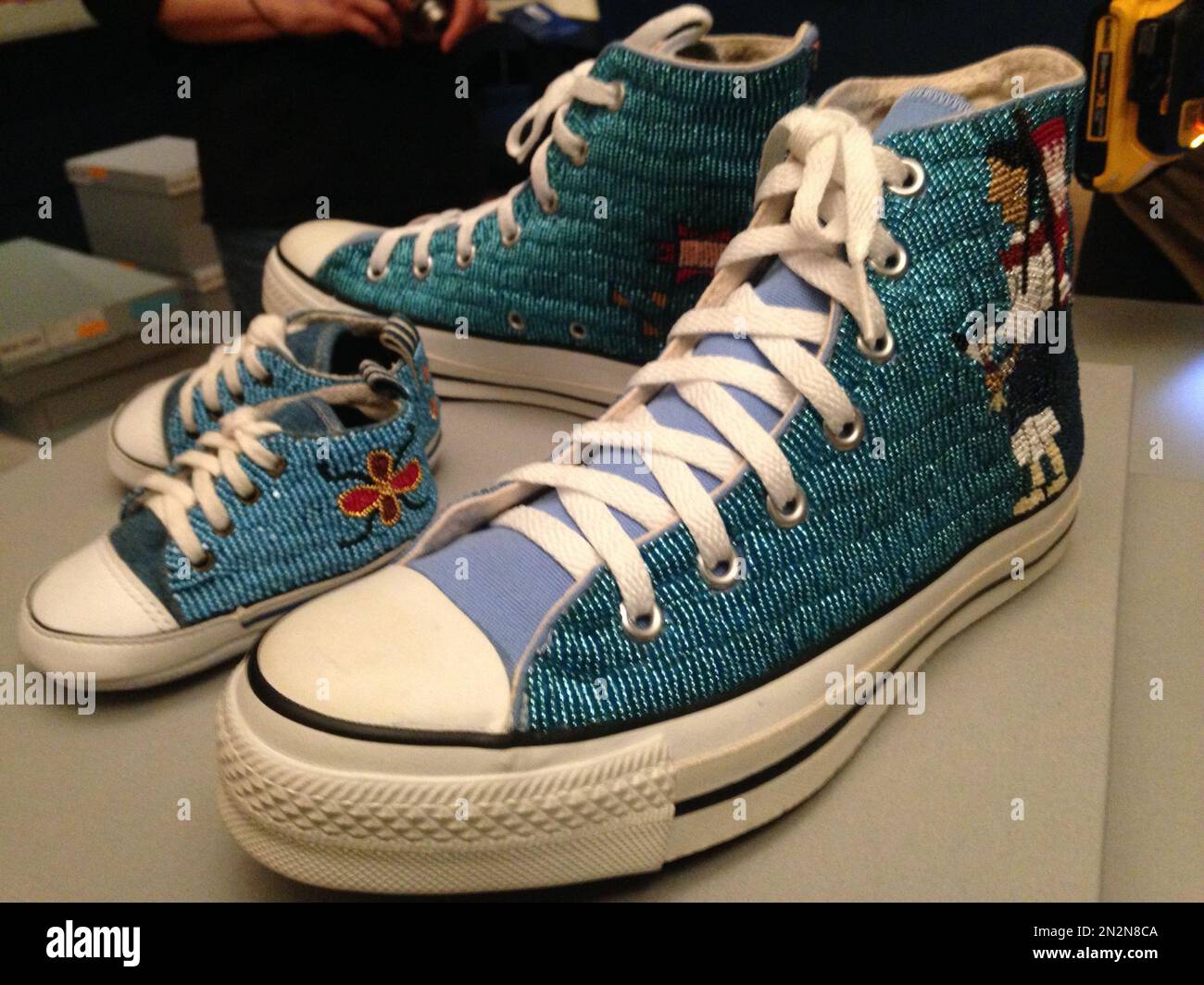 This photo taken March 16, 2015 shows Converse All-Star sneakers ...
