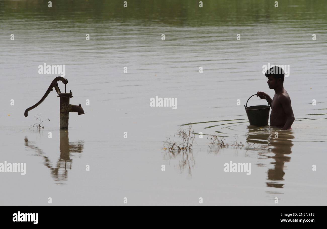 FILE - In this Monday, Aug. 25, 2015, file photo, an Indian villager ...
