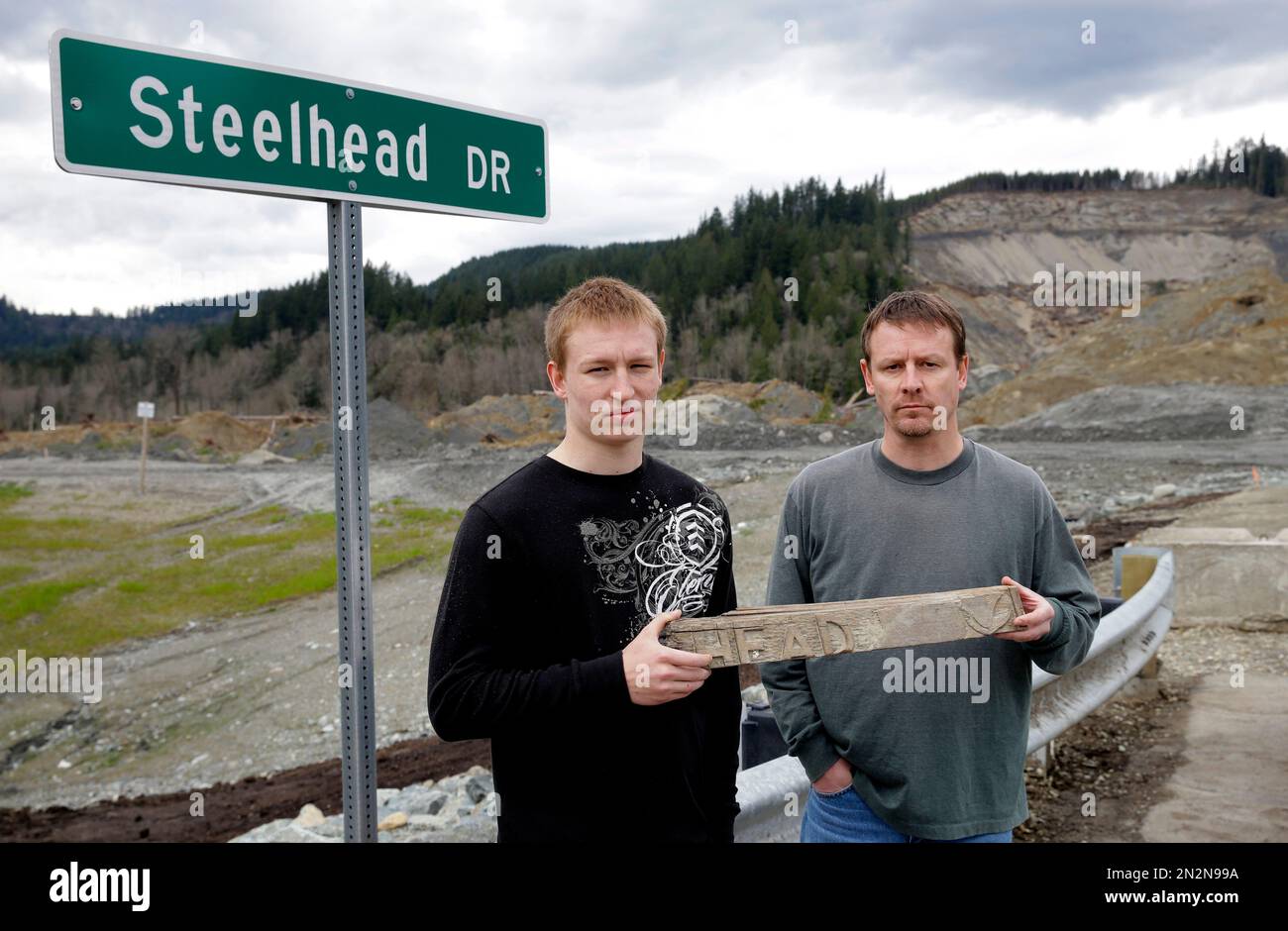Dayn Brunner, right, and his son Riley Brunner, left, pose for a photo ...