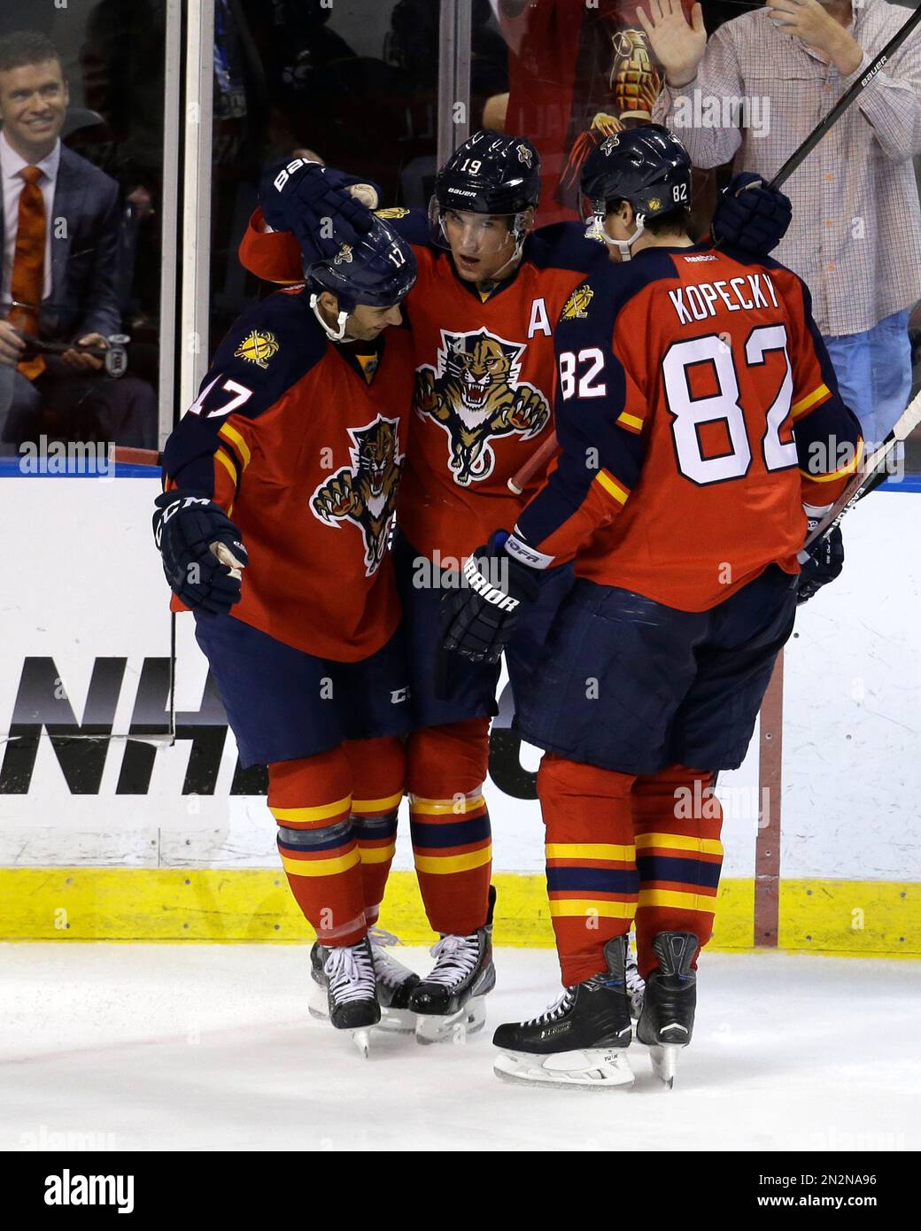 Florida Panthers right wing Scottie Upshall, center, celebrates with ...