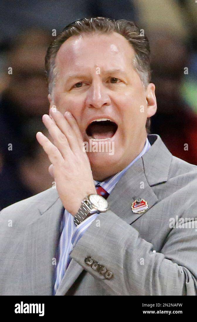 North Carolina State head coach Mark Gottfried works court side against ...