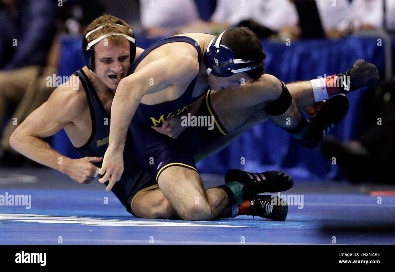 Missouri’s Alan Waters, left, wrestles Michigan's Conor Youtsey during ...