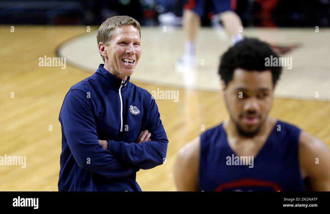 Gonzaga head coach Mark Few smiles as he looks on during practice for ...