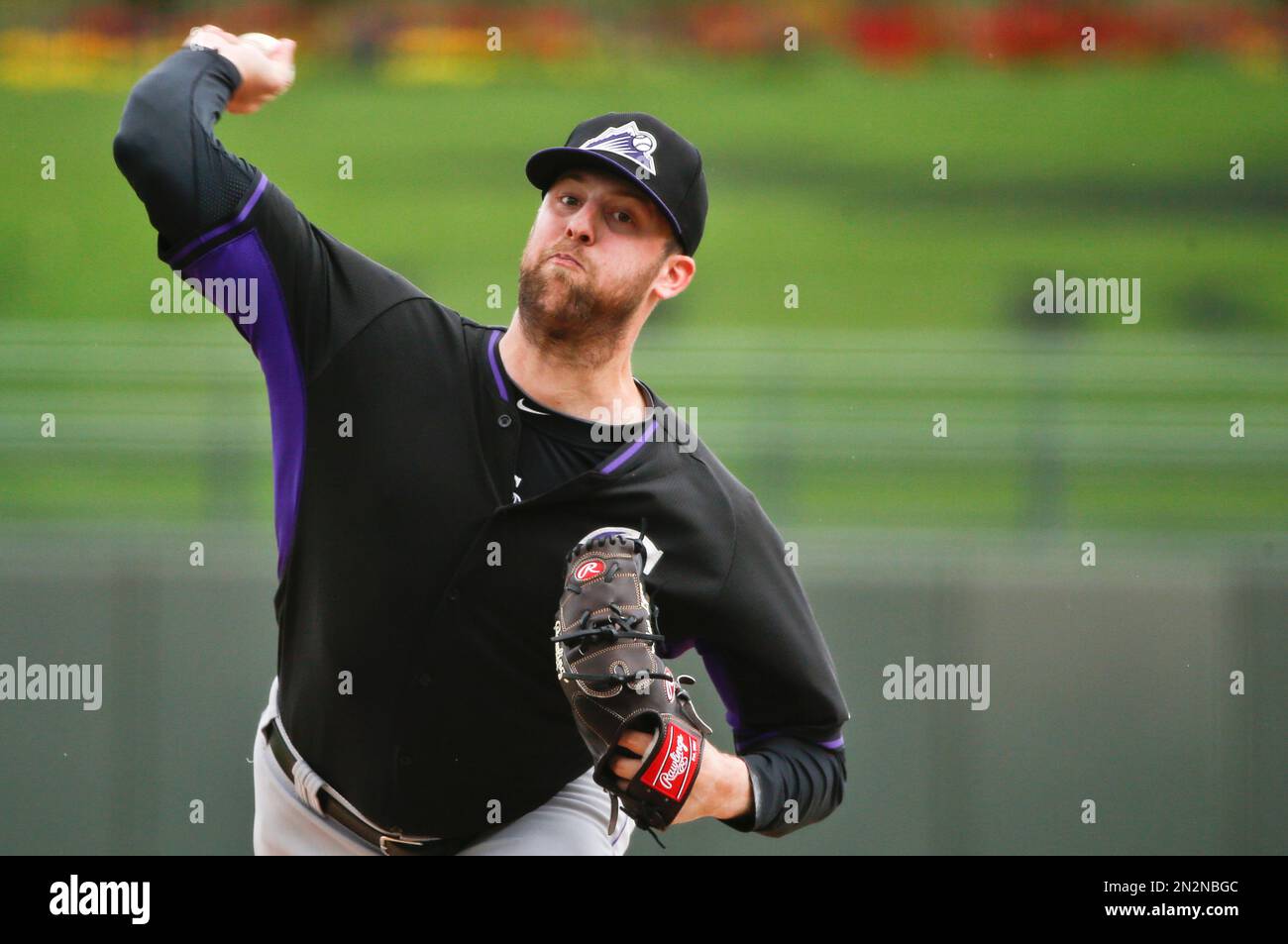 Colorado Rockies starting pitcher Jordan Lyles works against the Kansas ...