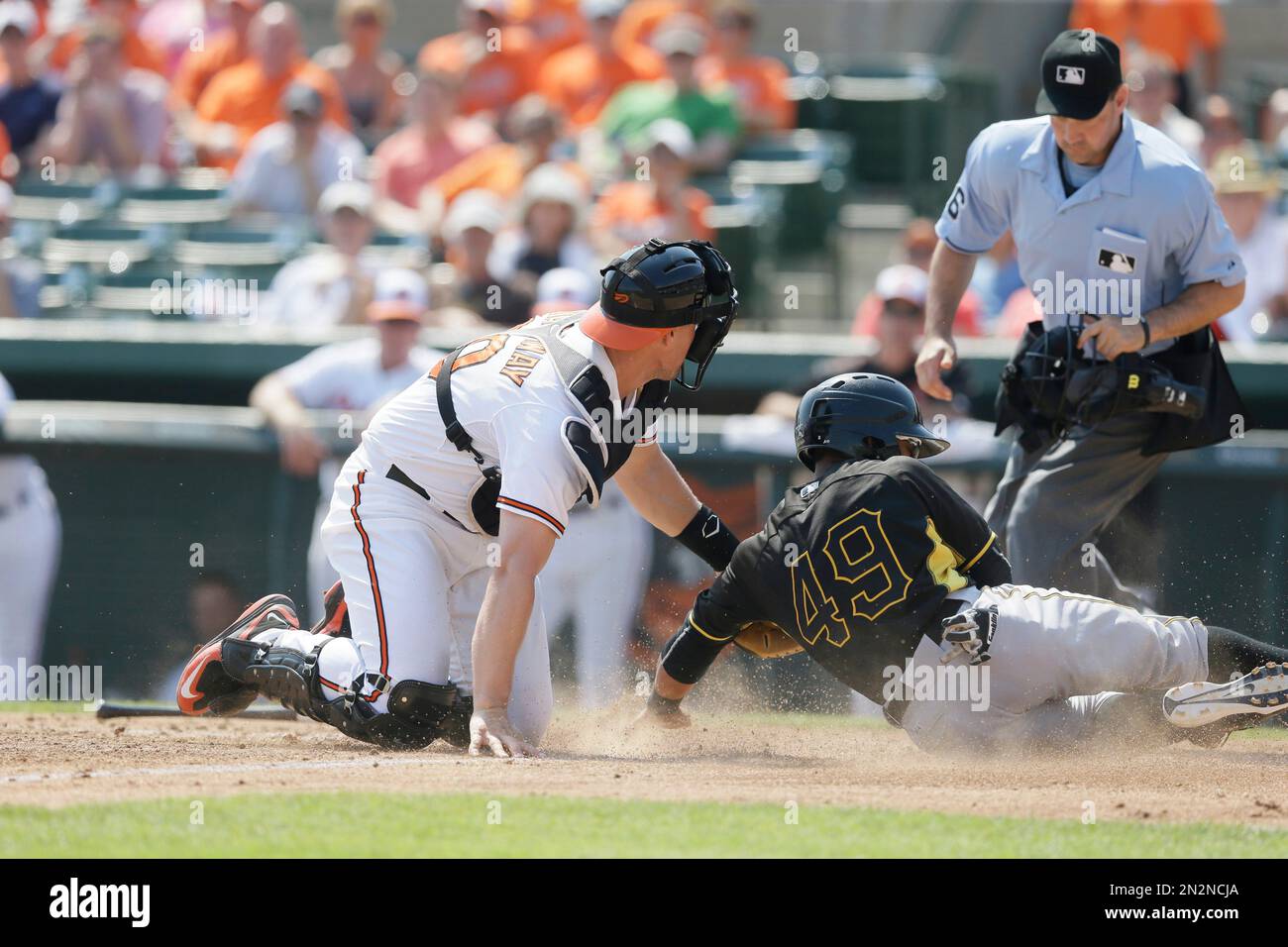 Pittsburgh Pirates' Elvis Escobar is tagged out by Baltimore Orioles ...