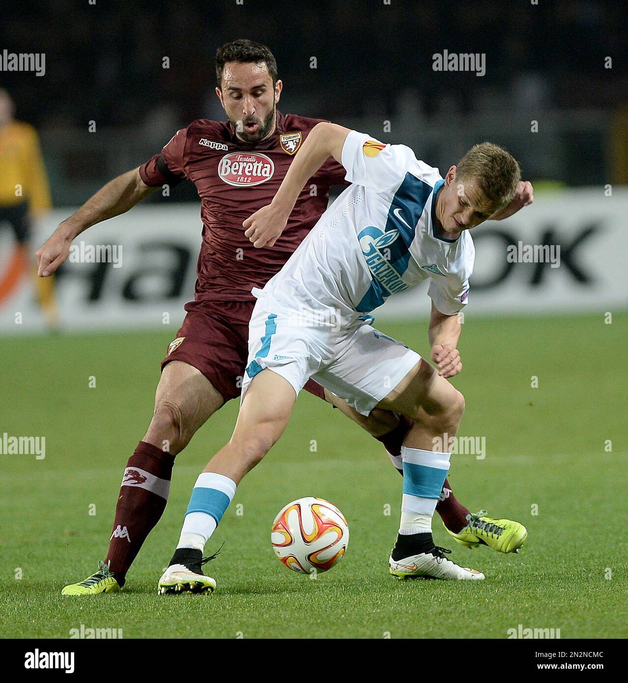 Zenit St. Petersburg' Igor Smolnikov challenges for the ball with ...