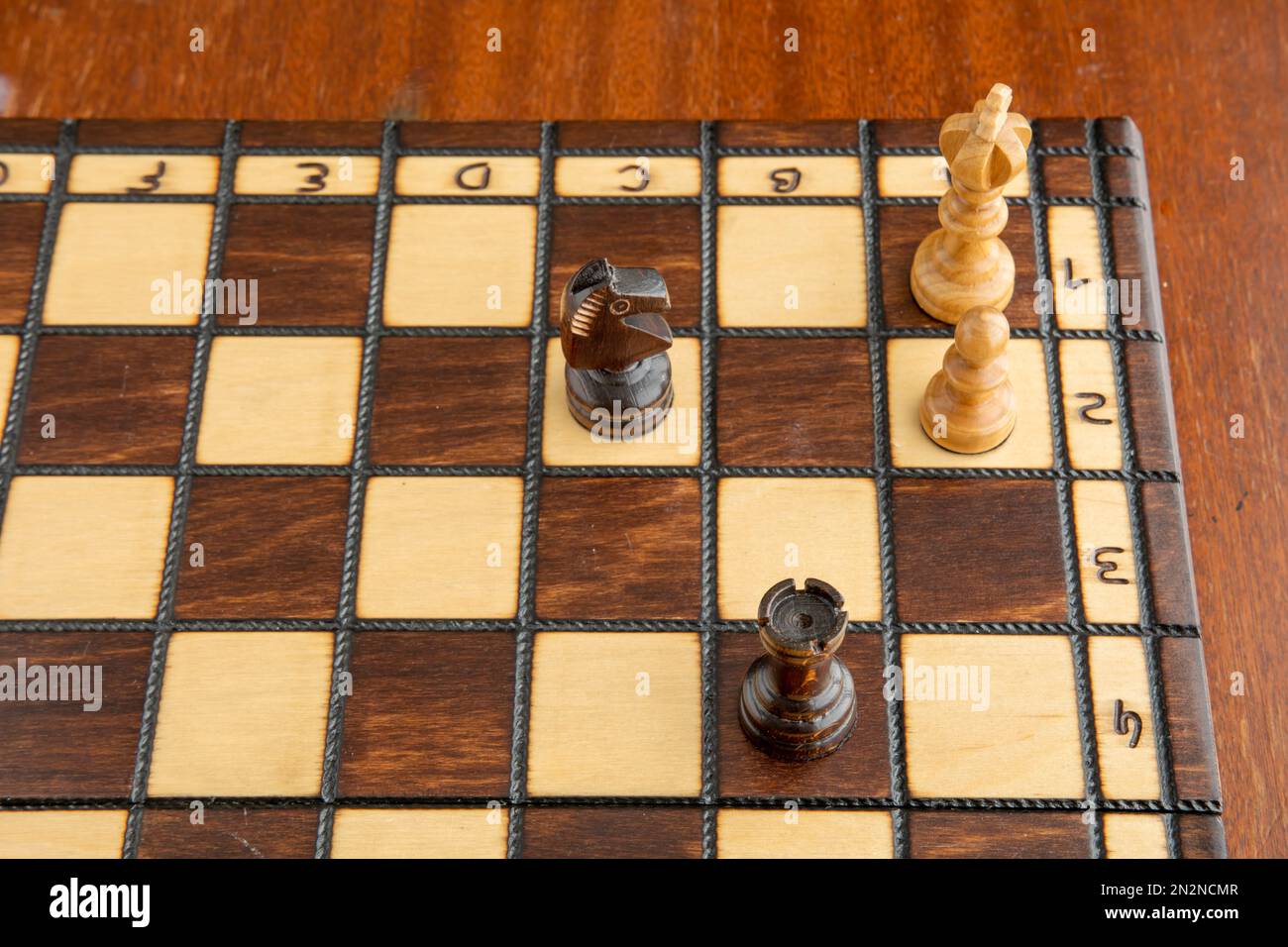 Corner mate delivered by rook and knight Stock Photo - Alamy