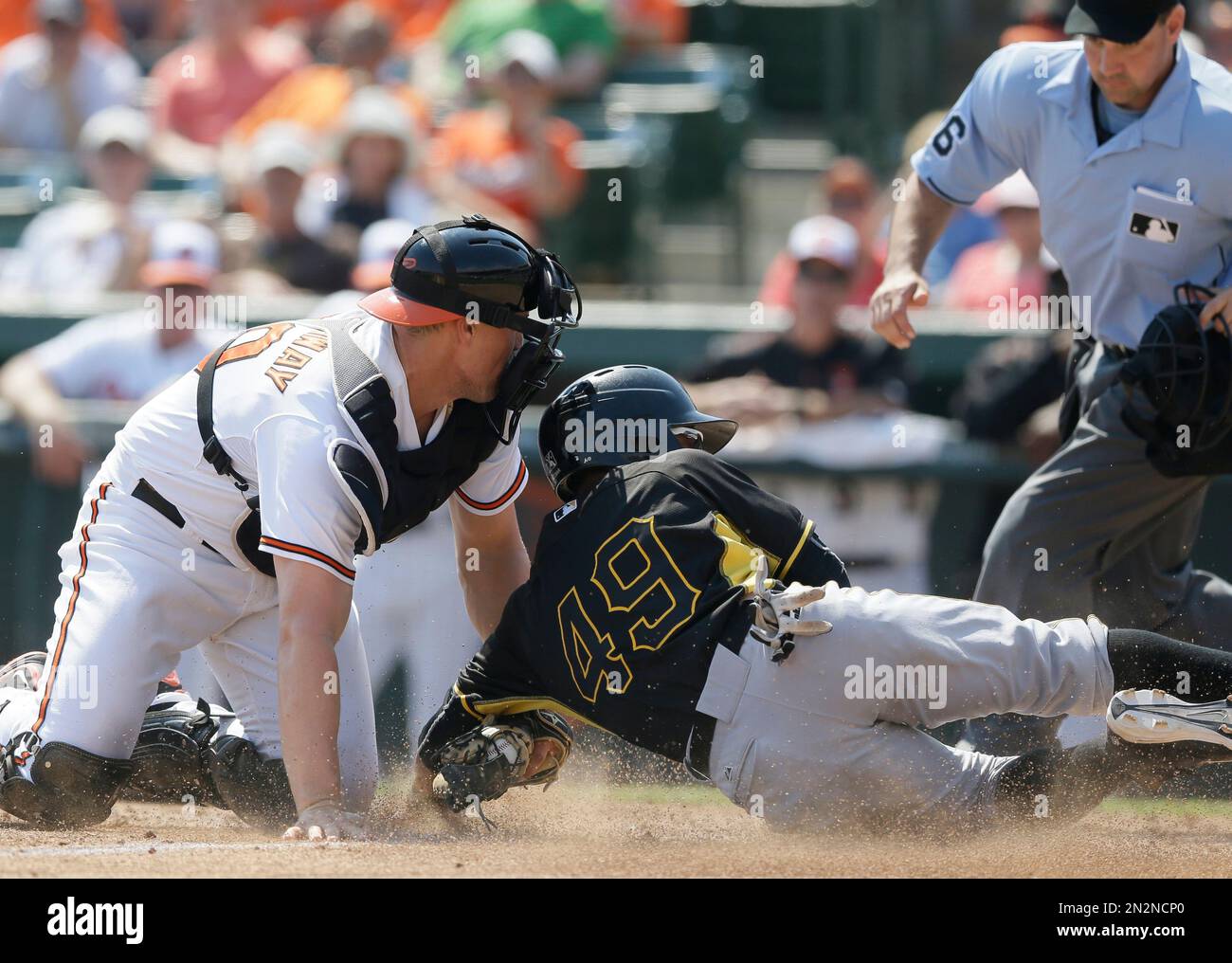 Pittsburgh Pirates' Elvis Escobar is tagged out by Baltimore Orioles ...