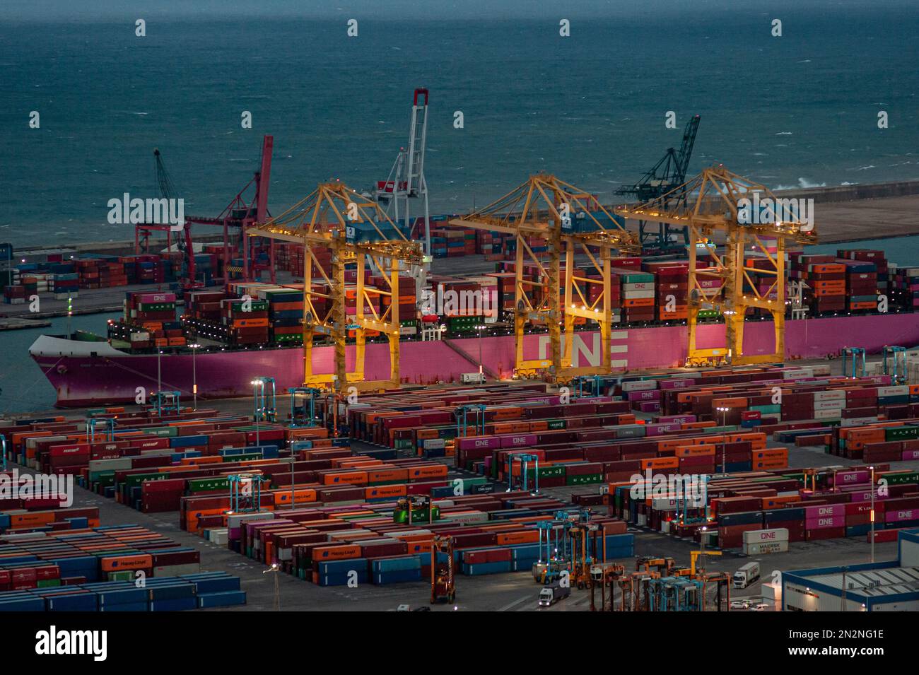 Ocean Network Express cargo ship loading and unloading containers at ...