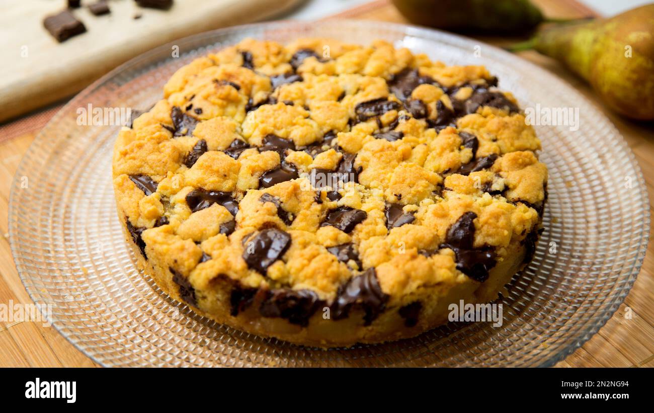 Pear and chocolate crumble.The crumble is a cake with fruits. It is ...
