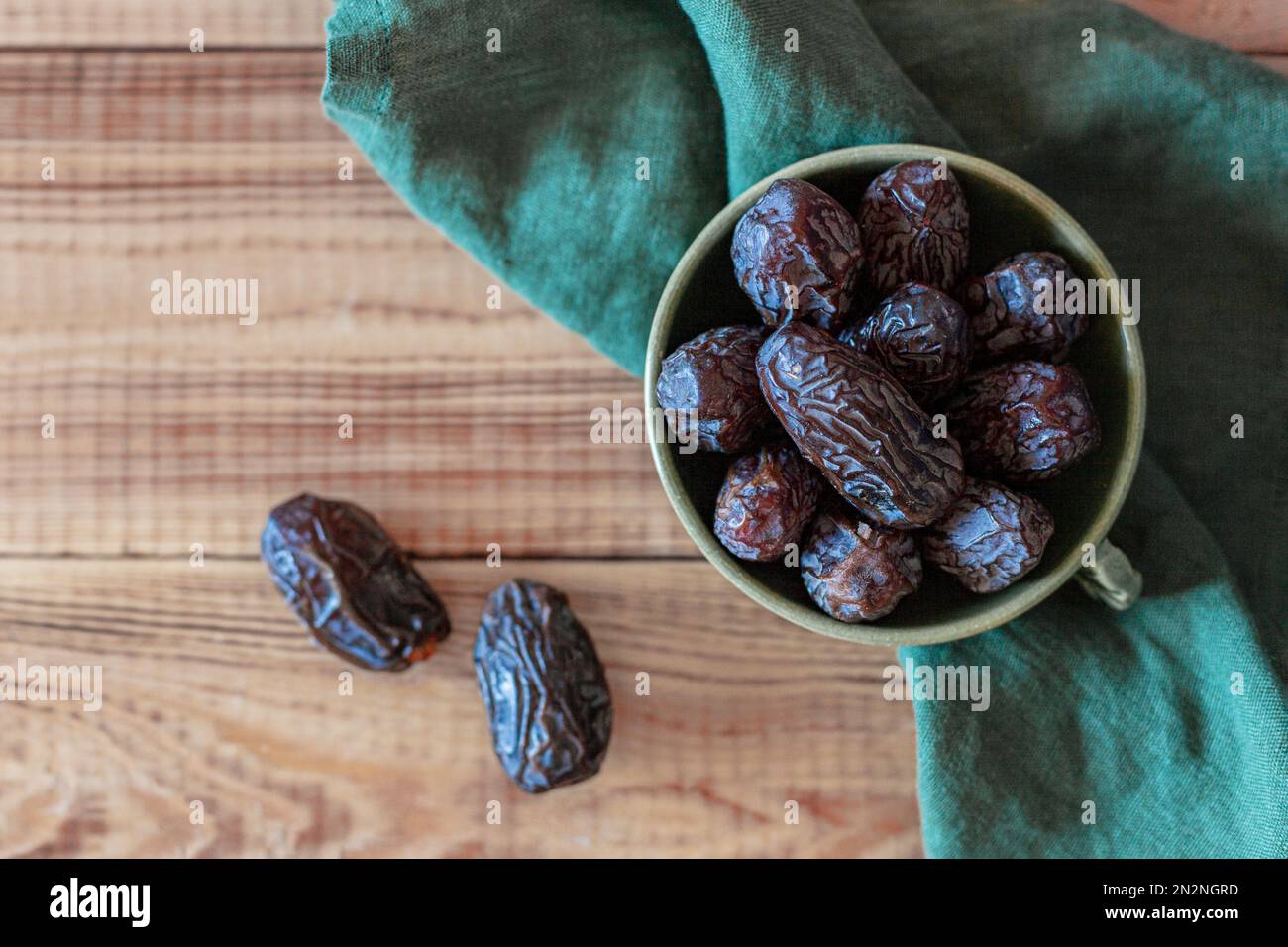 dates fruits in a bowl, top view, copy space Stock Photo - Alamy