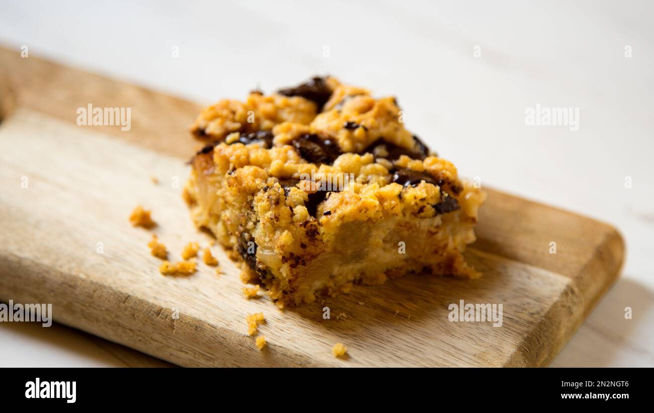 Pear and chocolate crumble.The crumble is a cake with fruits. It is ...