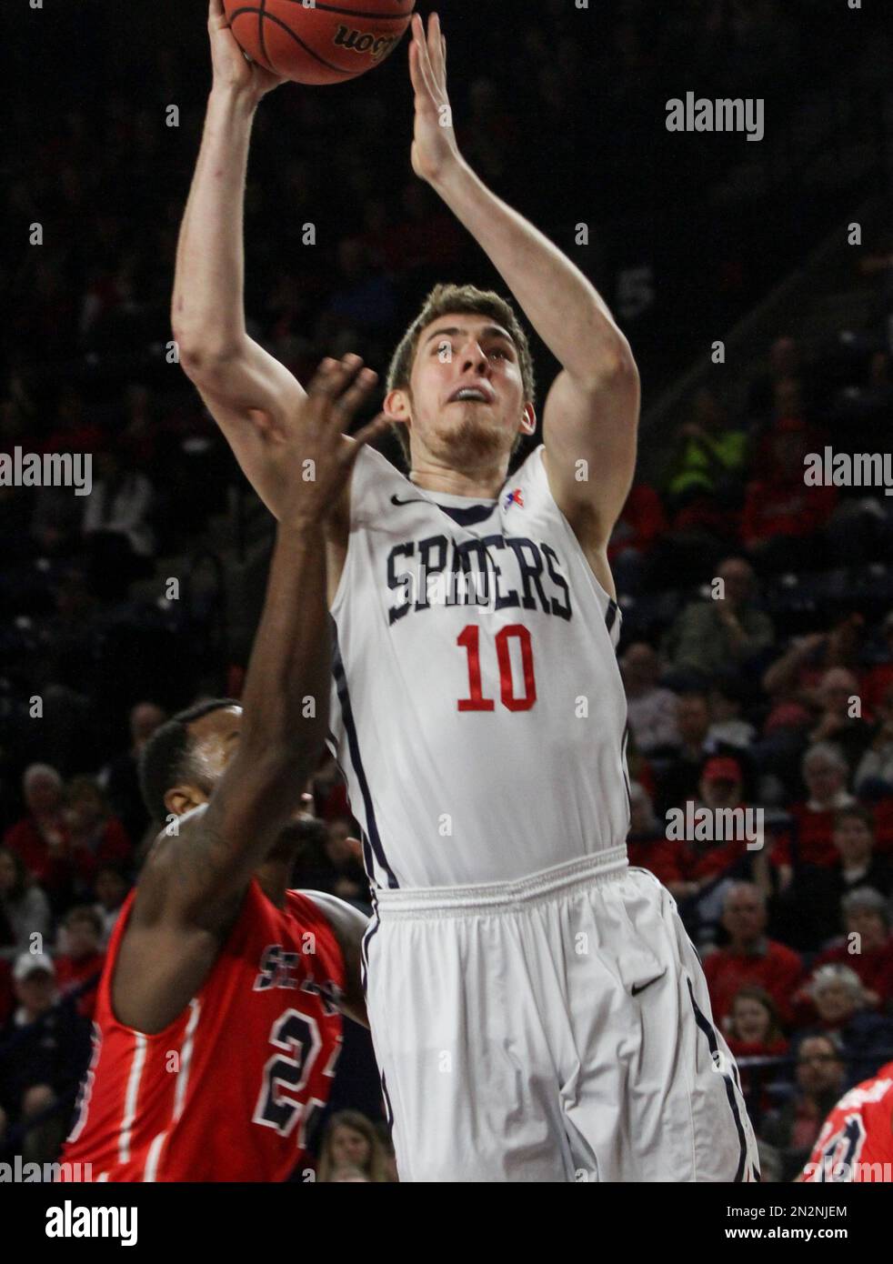 Richmond's T.J. Cline (10) is fouled by St. Francis's Lowell Ulmer ...