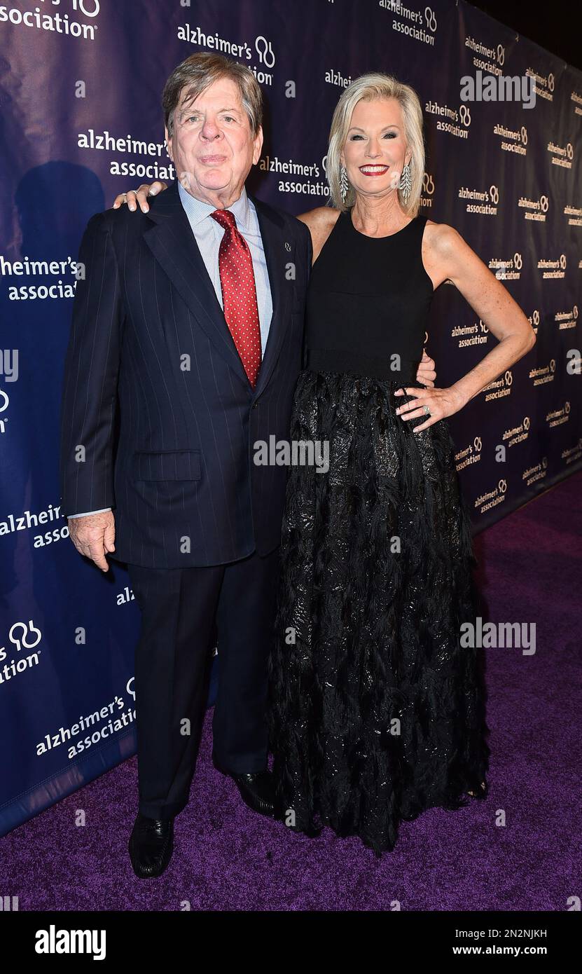 Event co-chairs Peter Grad, left, and Laurie Burrows Grad arrive at the ...