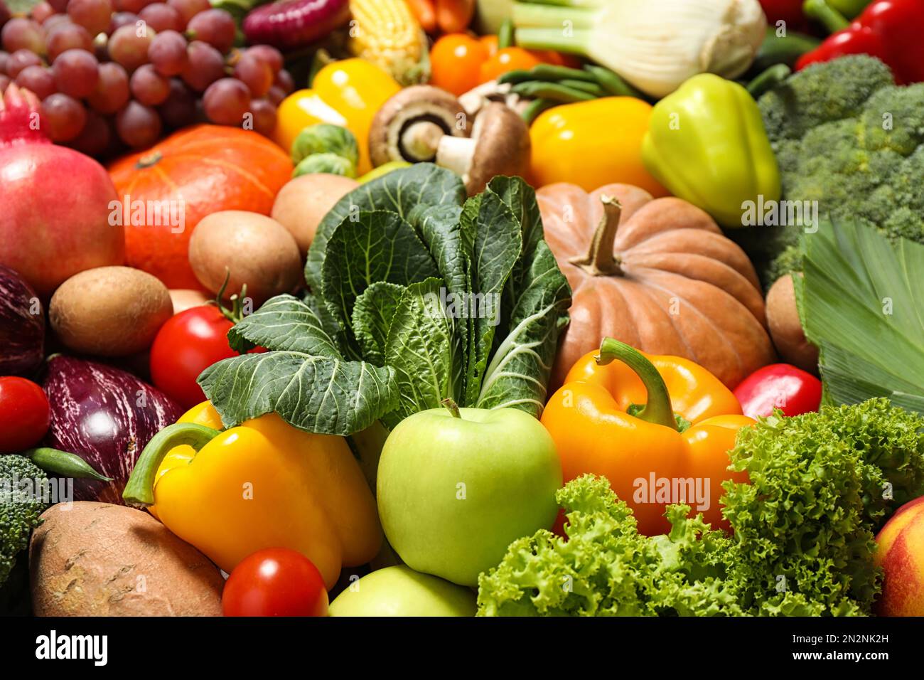 Assortment of organic fresh fruits and vegetables as background ...