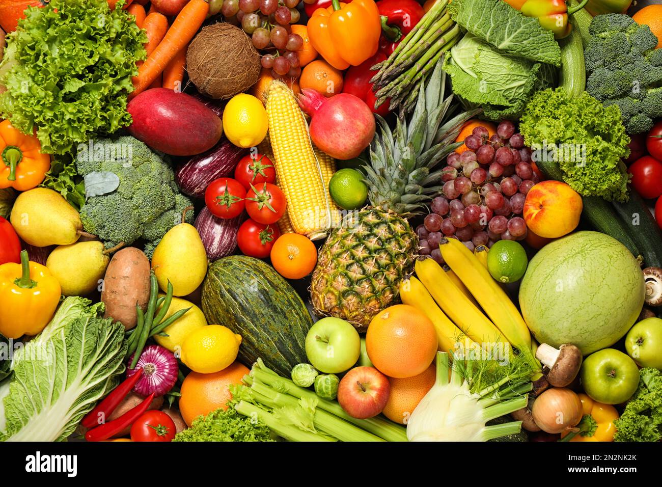 Assortment of organic fresh fruits and vegetables as background ...