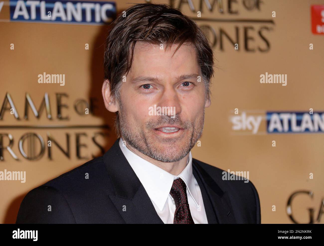 Nikolaj Coster-Waldau poses for photographers upon arrival at the Tower ...