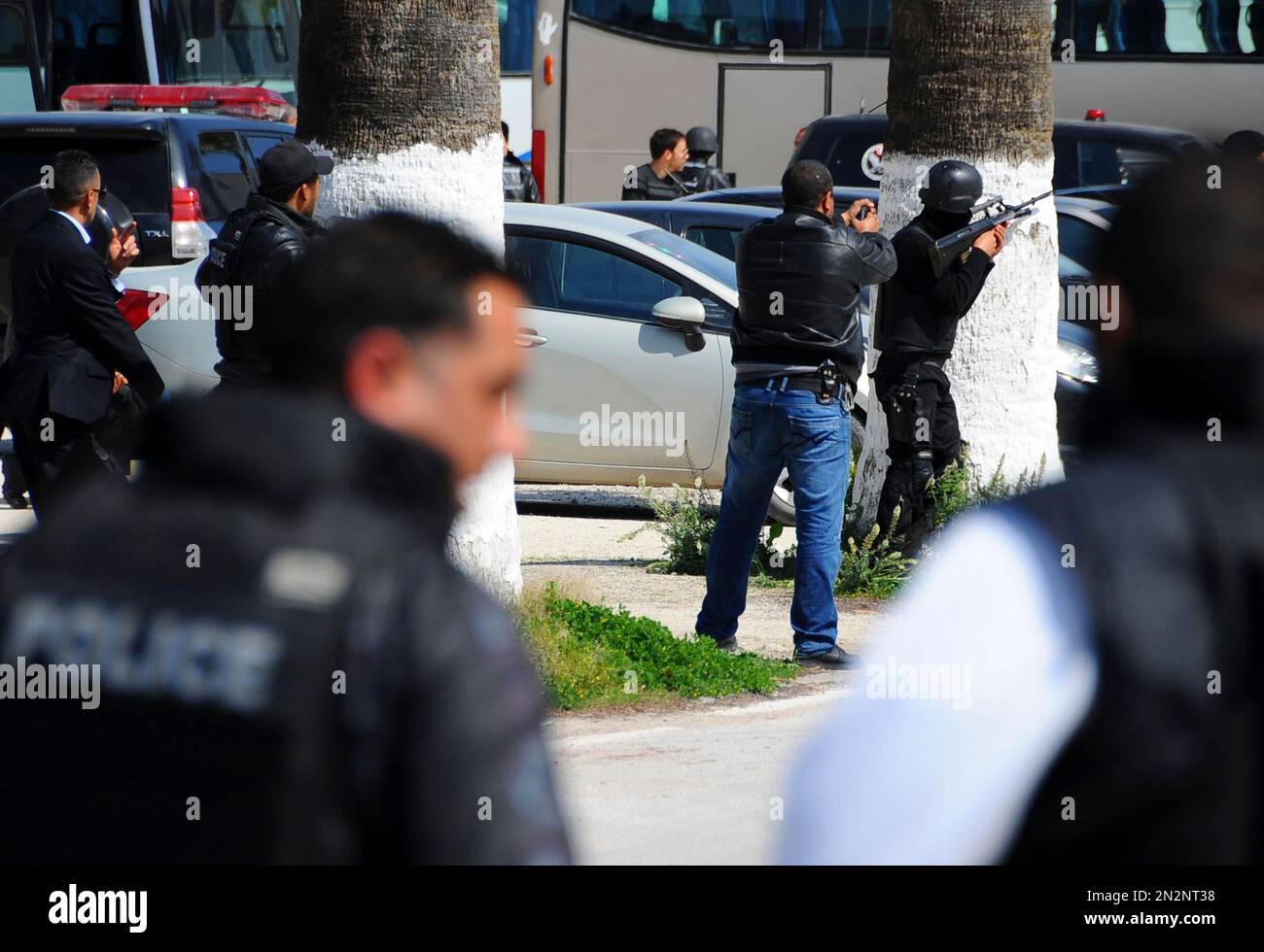 Security officers man positions outside the Bardo Museum after an ...