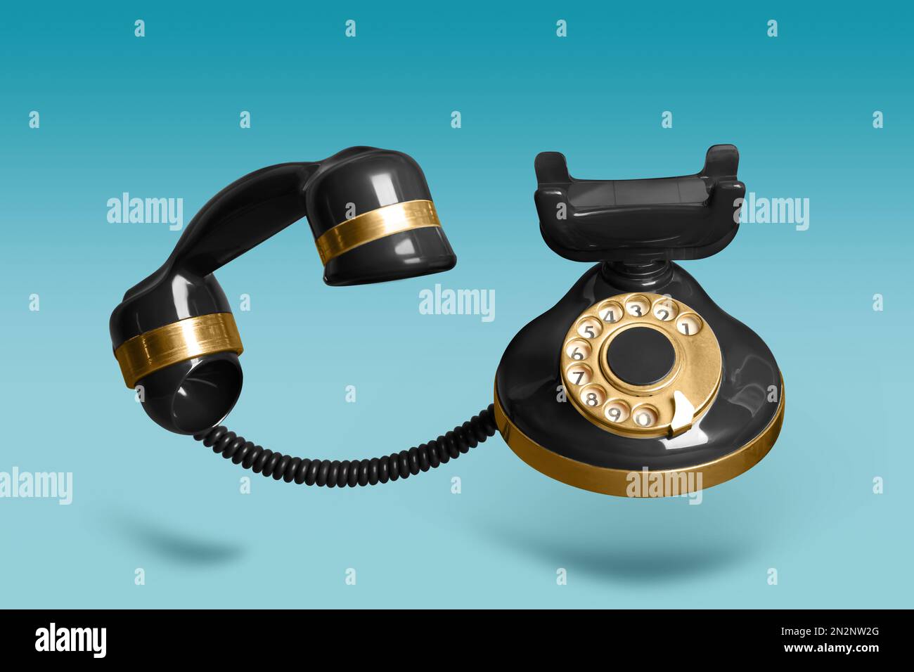 Vintage black corded telephone flying in air on light blue background ...