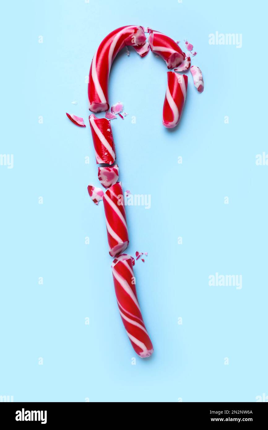 Crushed Christmas candy cane on light blue background, top view Stock ...