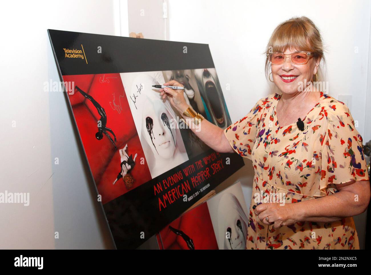 Executive producer Jennifer Salt signs the event poster backstage for ...