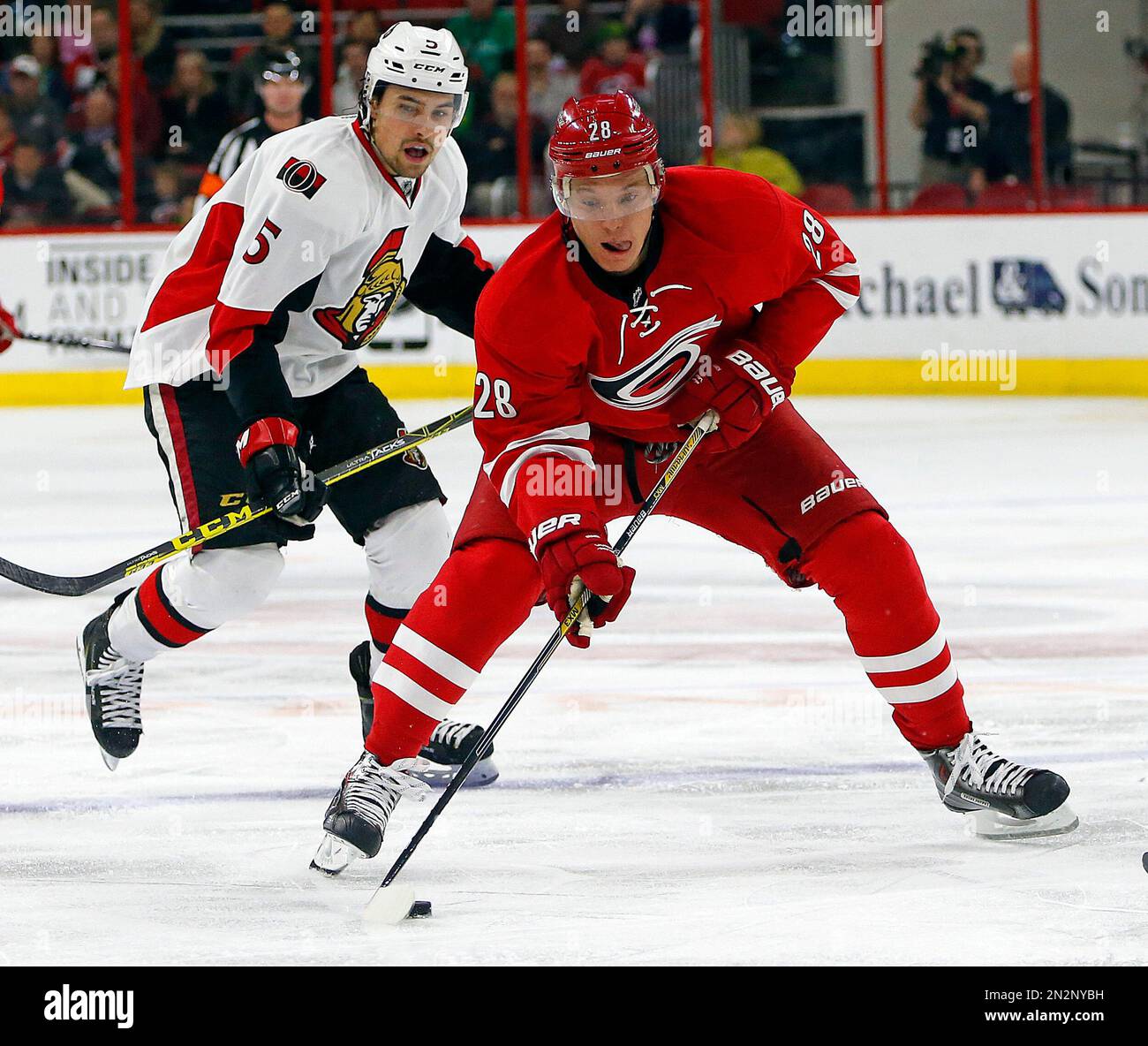 Carolina Hurricanes' Alexander Semin (28) of Russia, brings the puck up ...