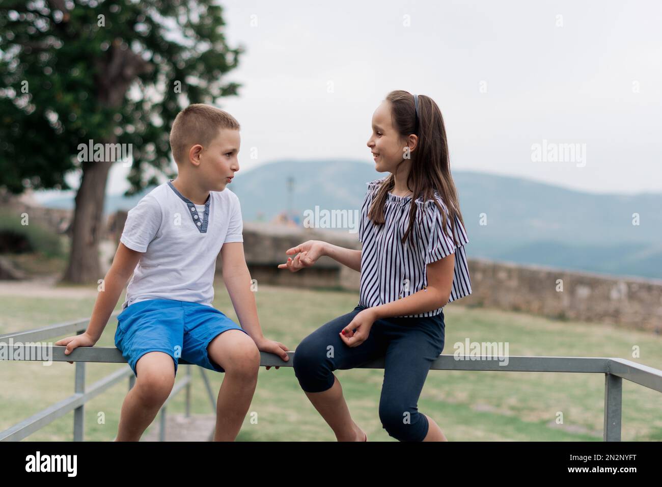 Brother and sister talking hi-res stock photography and images - Alamy