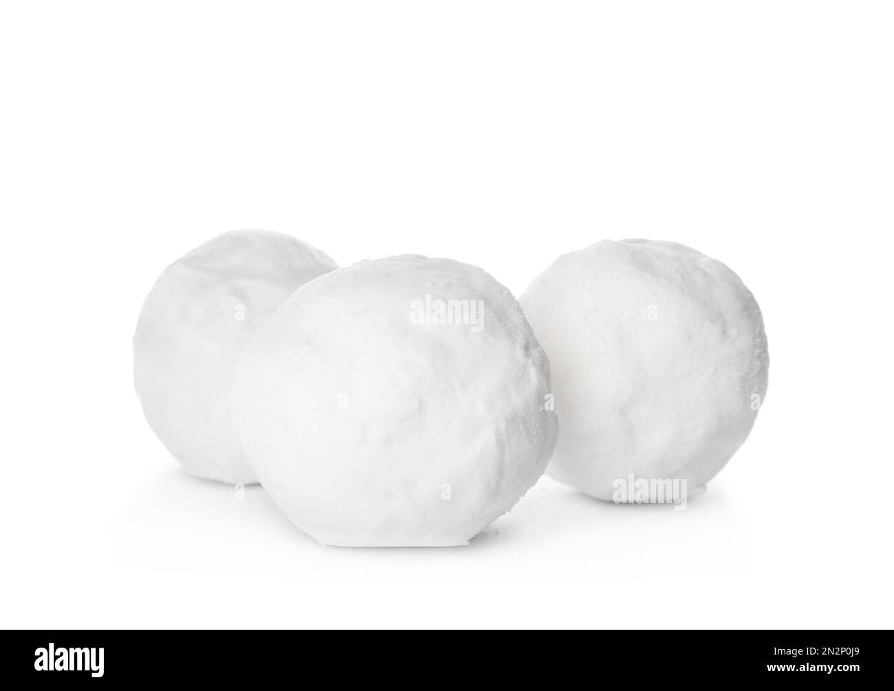 Round snowballs isolated on white. Winter activities Stock Photo - Alamy