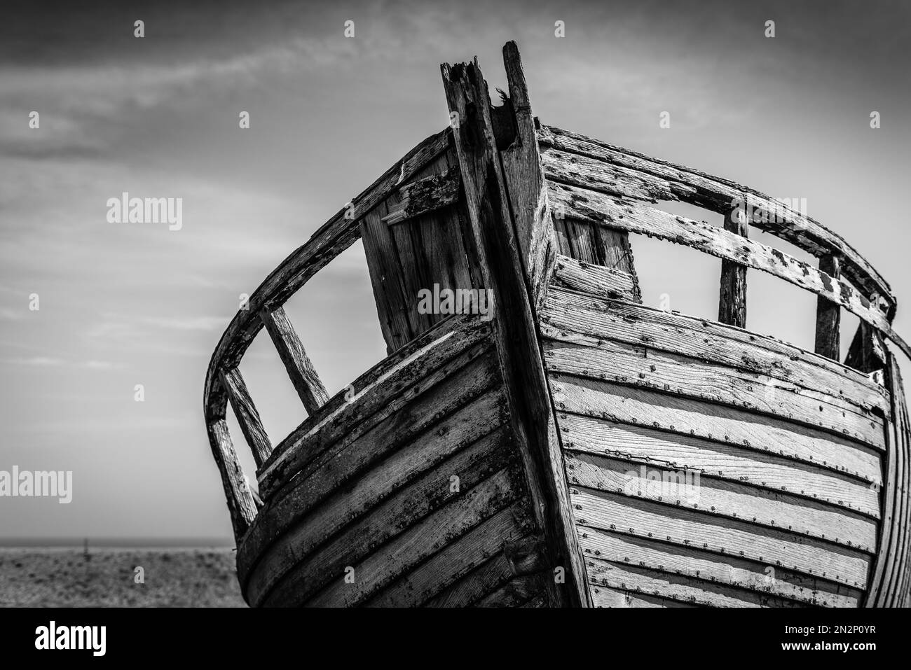 Beautiful old wooden fishing boats, abandoned on the shale beach at ...
