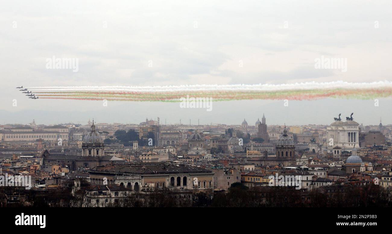 The 'Frecce Tricolori' Italian Air Force acrobatic squad fly over Rome ...