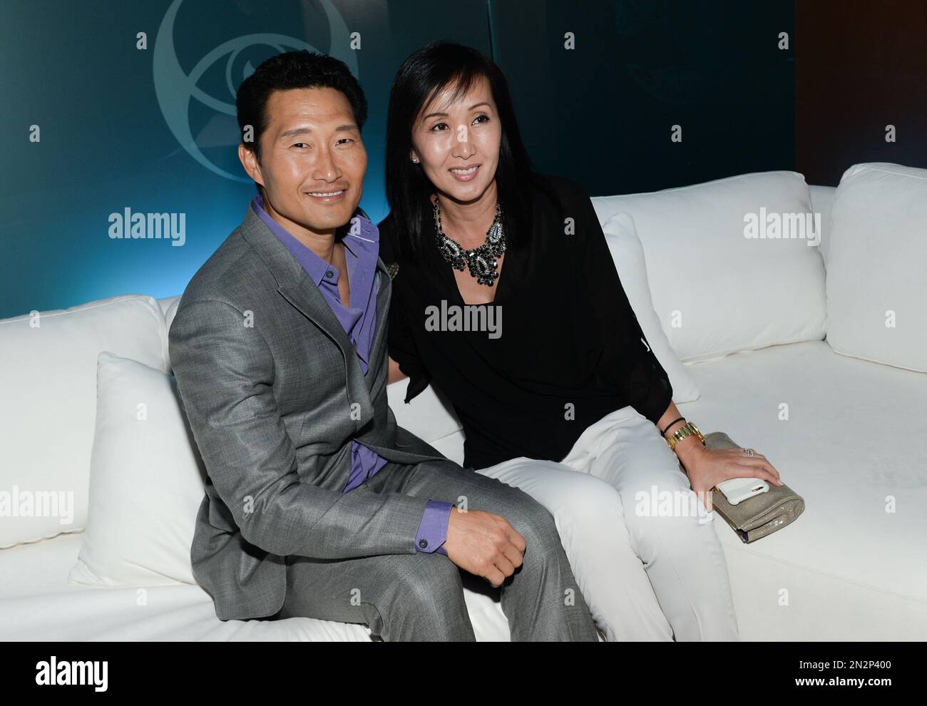 Actor Daniel Dae Kim and wife Mia attend "The Divergent Series ...