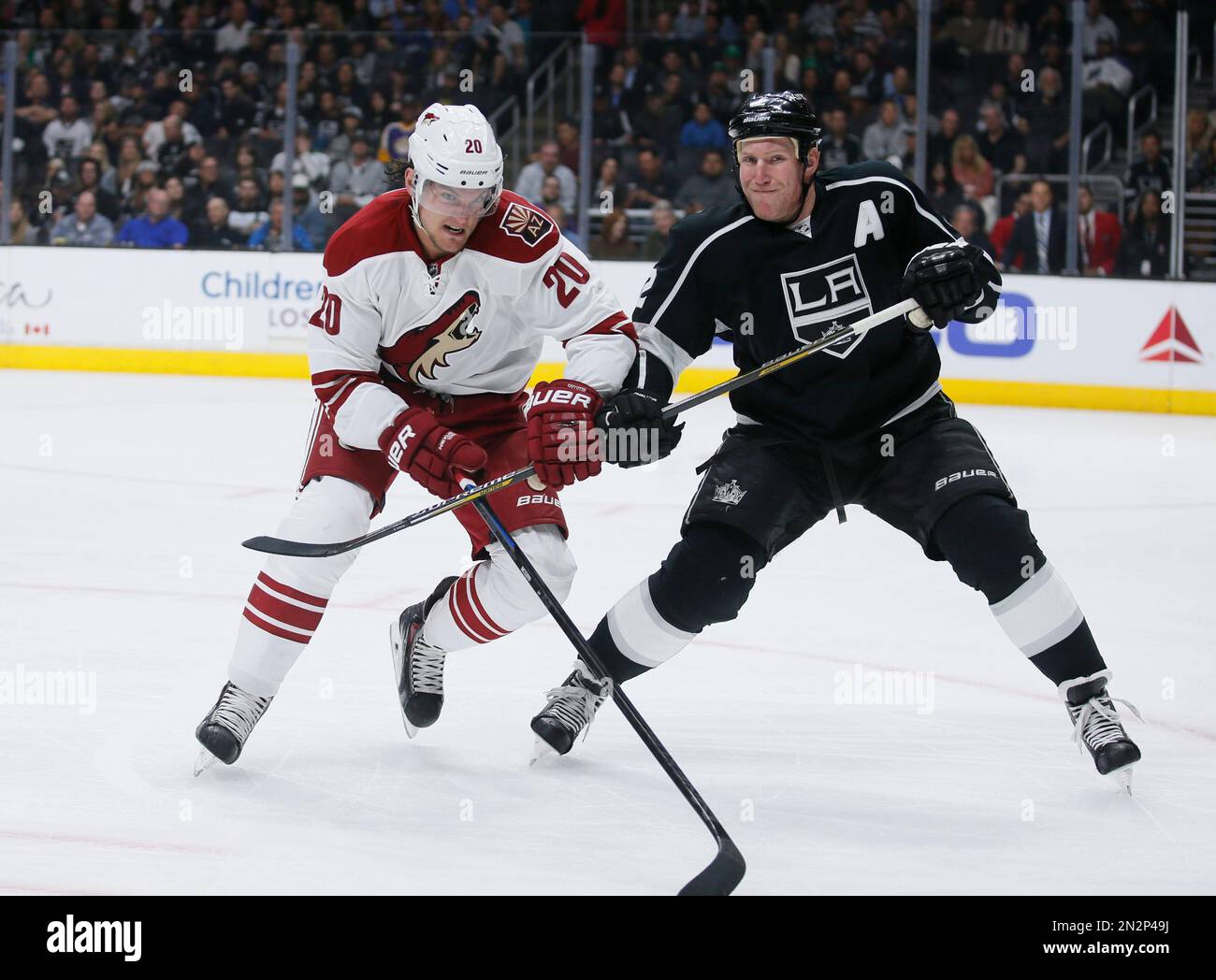 Arizona Coyotes left wing Tye McGinn, left, and Los Angeles Kings ...