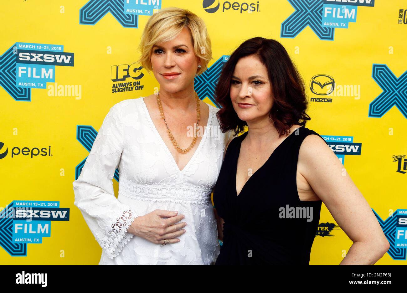 Molly Ringwald, left, and Ally Sheedy walk the red carpet for "The ...