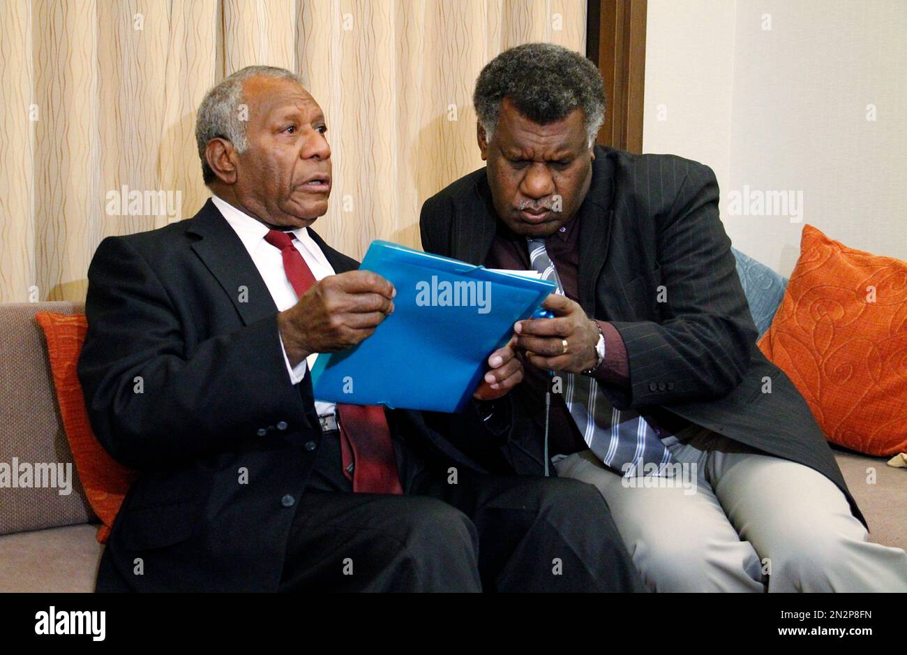 Vanuatu President Baldwin Lonsdale, left, and Minister for Climate Change James Bule discuss ...